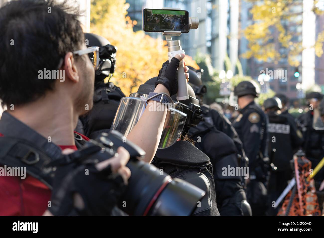 Man filming a protest hi-res stock photography and images - Alamy