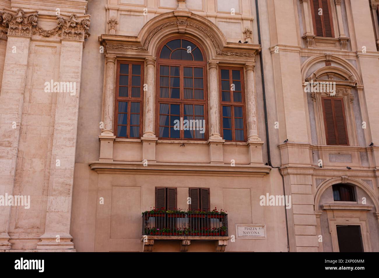 Exterior facade view of Italian architectural building with large ...
