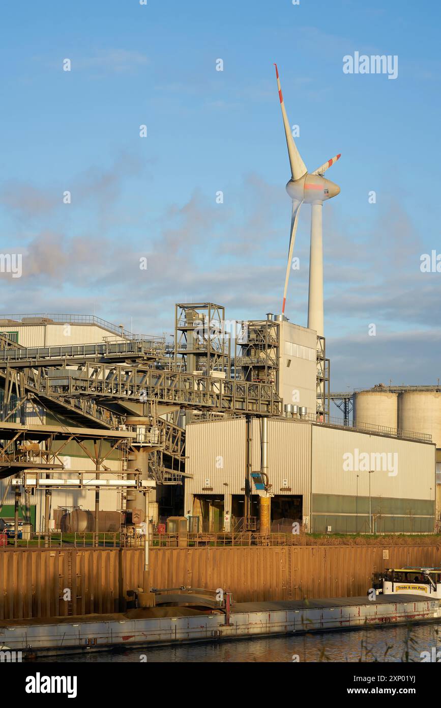 Industrial harbour in Magdeburg. An Enercon wind turbine in the ...