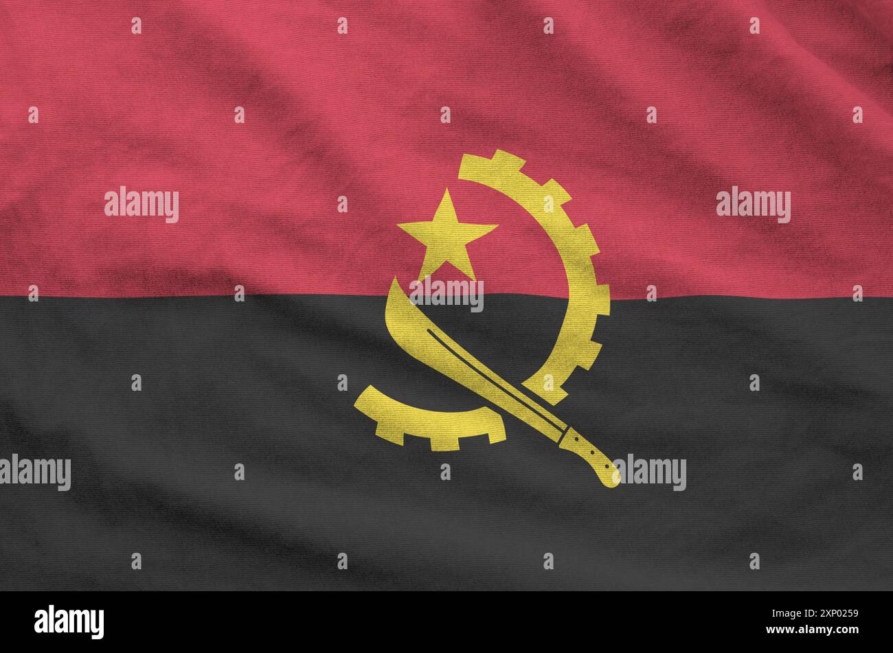 Angola flag depicted on folded wavy fabric of old cloth close up Stock ...