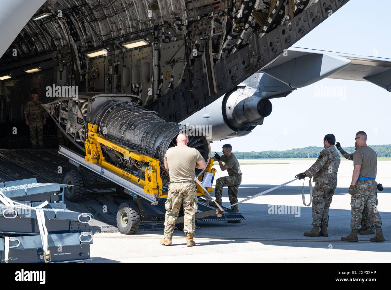 Aircrew position a YF-119 Engine into a C-17 Globemaster at Wright ...