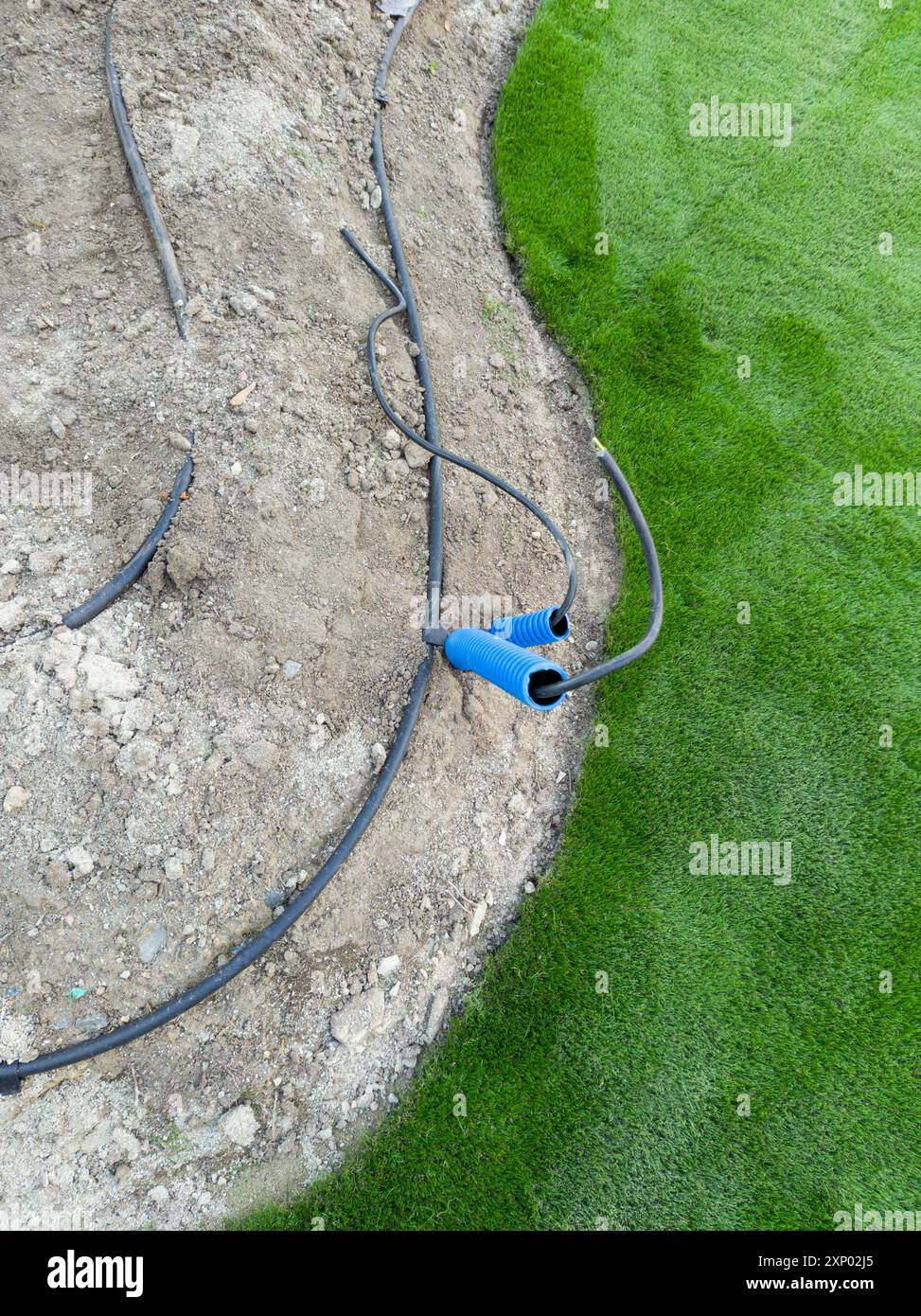 Garden Irrigation and Electrical System Installation Stock Photo - Alamy