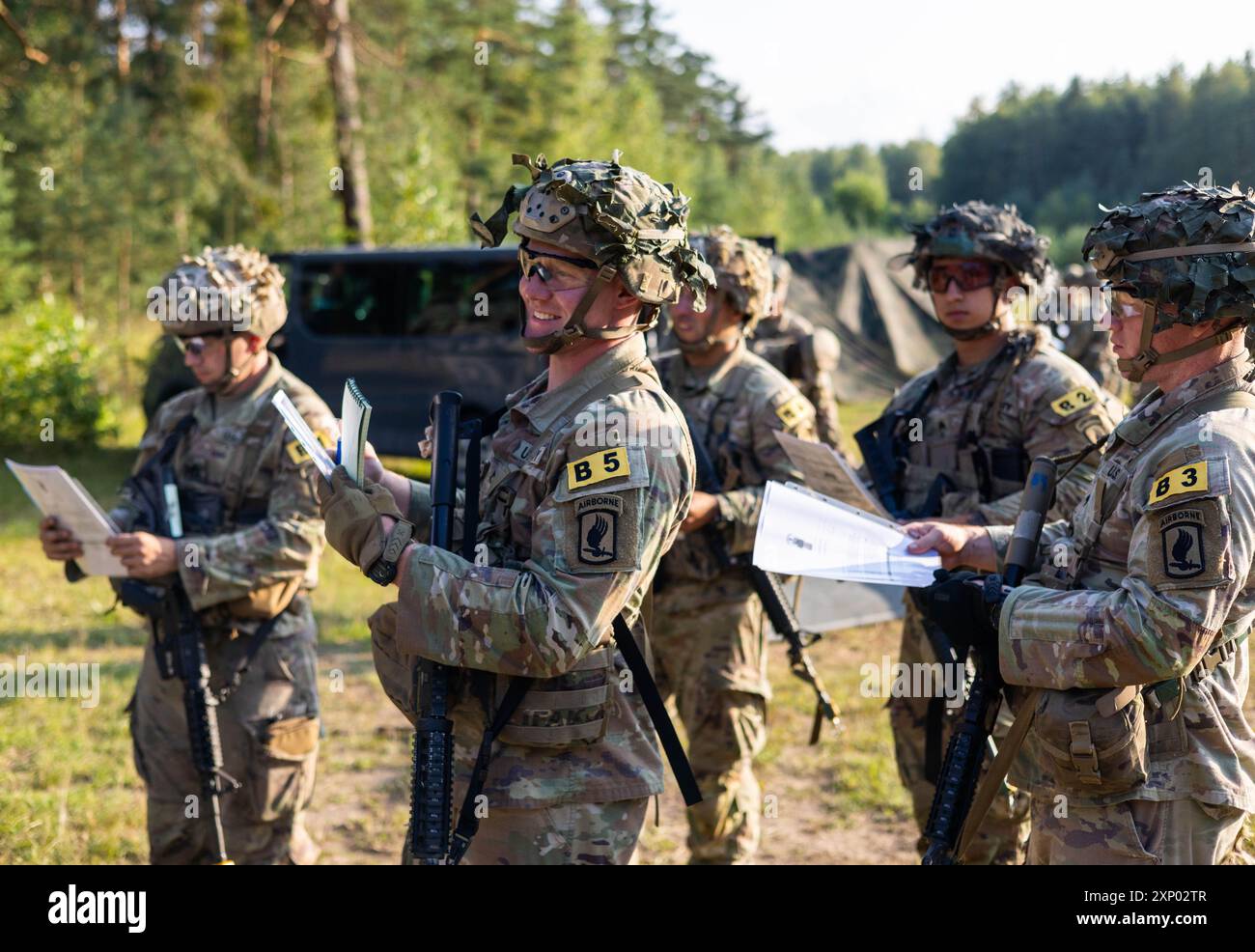 U.S. Soldiers, assigned to various units within U.S. Army Europe and Africa, receive their maps ...