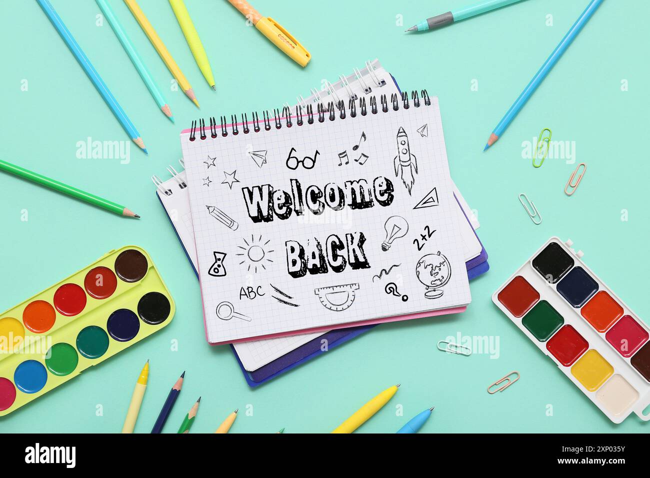 Banner with school stationery and text WELCOME BACK on turquoise ...