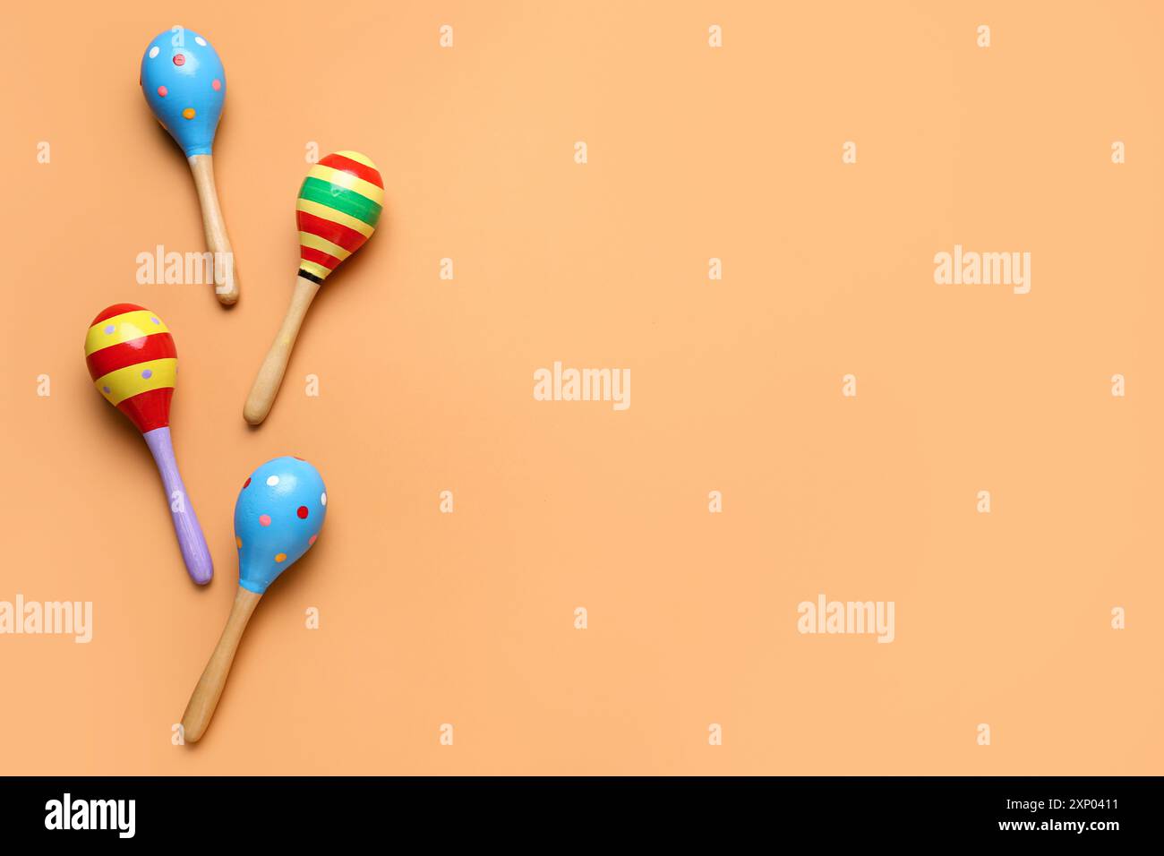Mexican maracas on orange background Stock Photo - Alamy