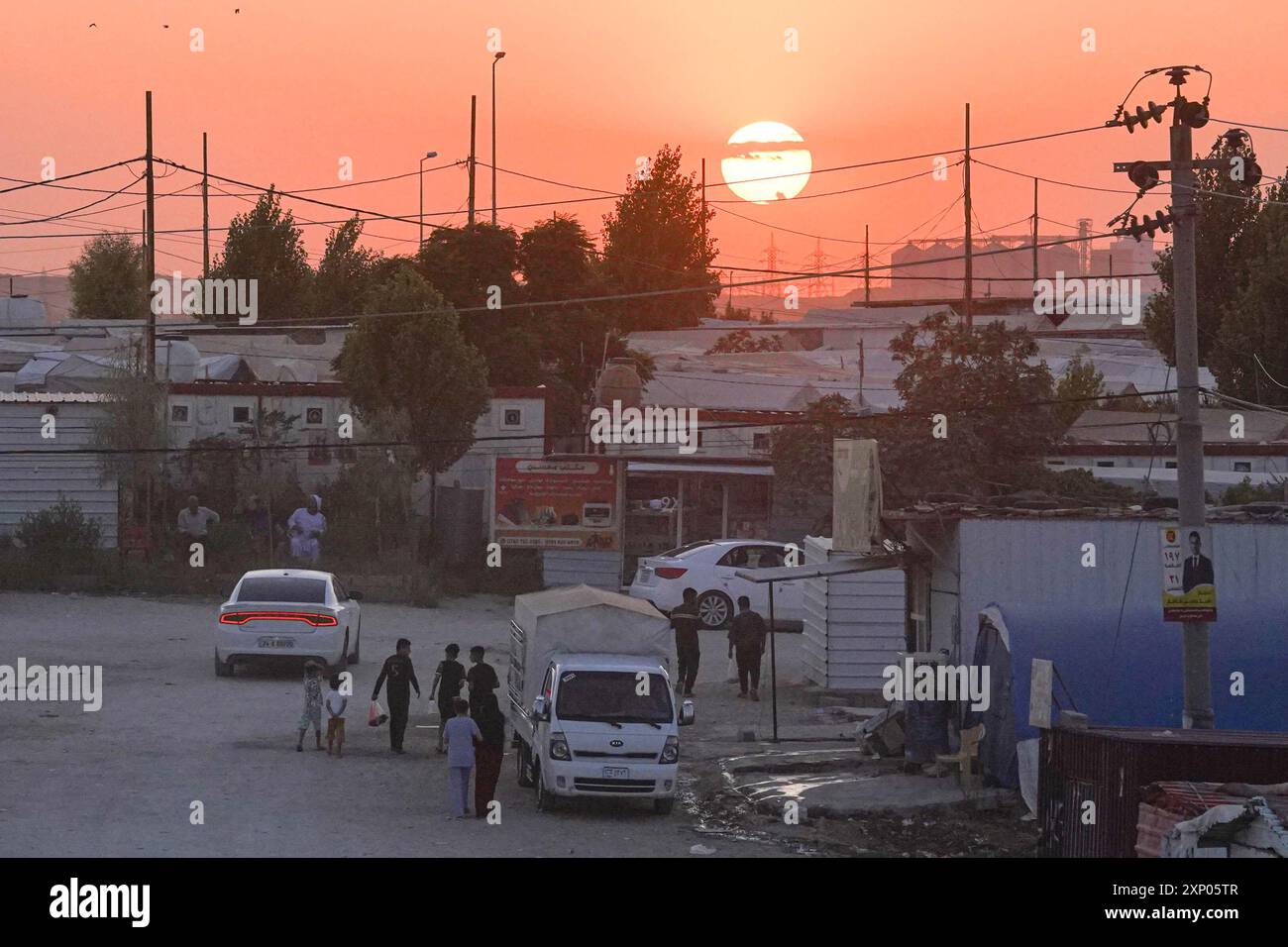 Dohuk, Iraq. 31st July, 2024. General view of the sunset in Sharya camp ...