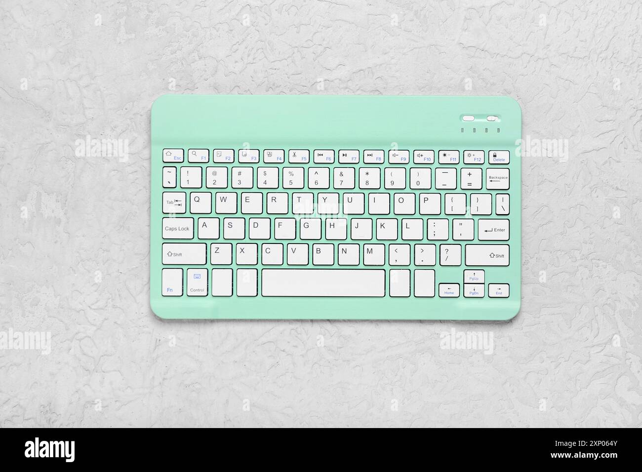Stylish cyan keyboard on white background Stock Photo - Alamy