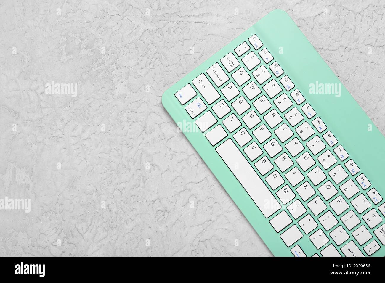 Stylish cyan keyboard on white background Stock Photo - Alamy