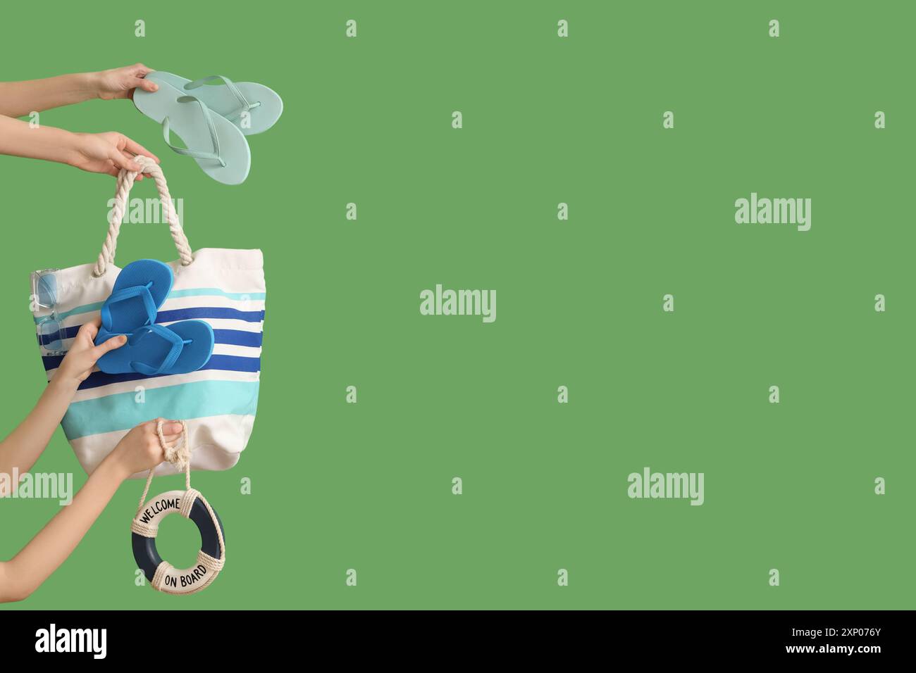 Hands holding flip flops hi-res stock photography and images - Alamy