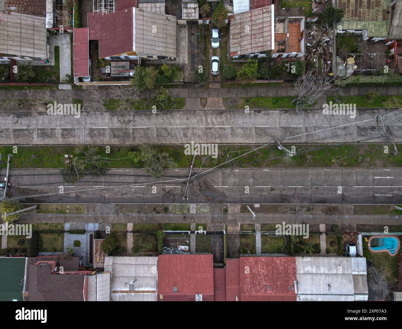 An aerial view of downed utility poles felled during a storm in ...
