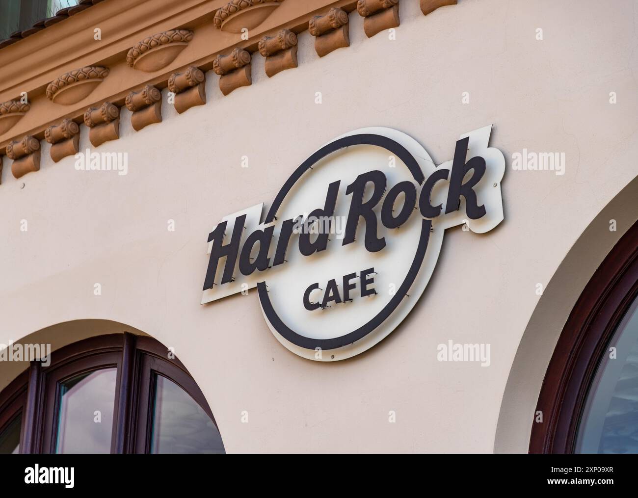 A picture of the Hard Rock Cafe logo on display outside one of the ...