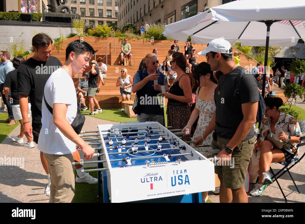 New York, USA. 1st Aug, 2024. People play with a foosball table at the ...