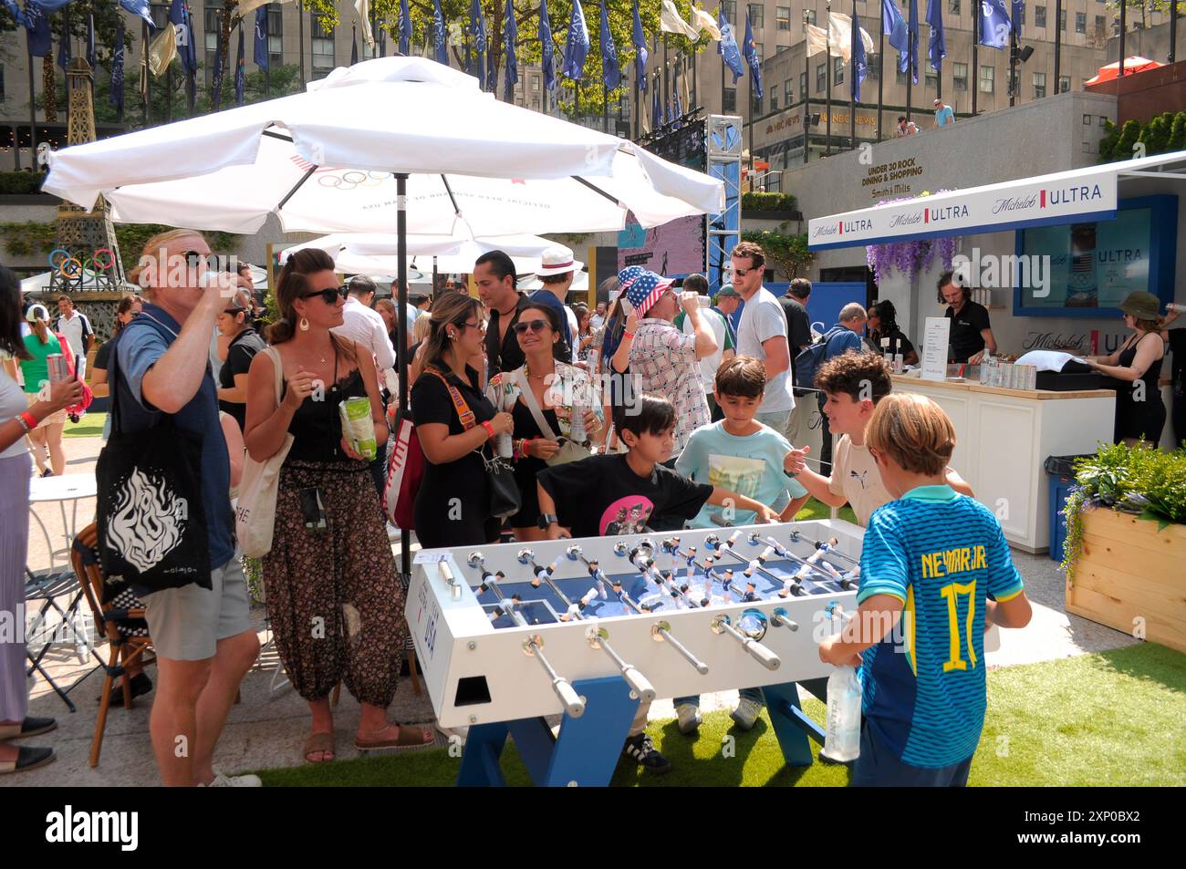 New York, USA. 1st Aug, 2024. Children play with a foosball table at ...