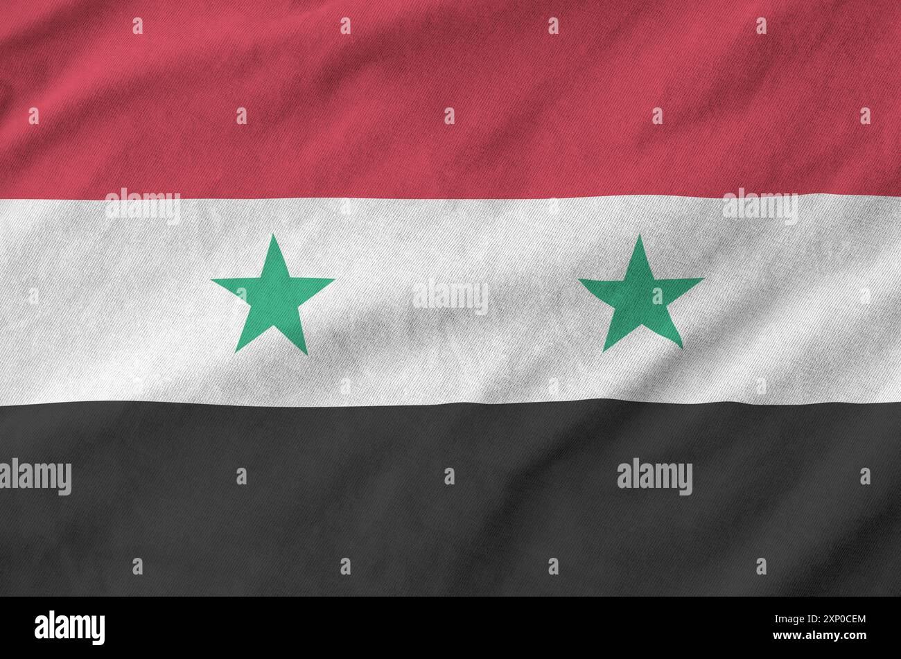 Syria flag depicted on folded wavy fabric of old cloth close up Stock ...