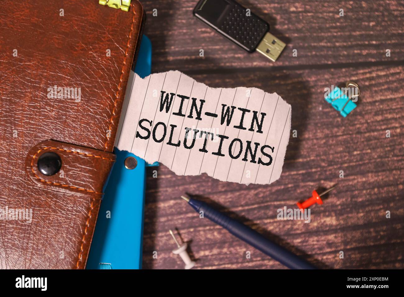 win-win solution concept - handwriting on a clipboard with a cup of ...