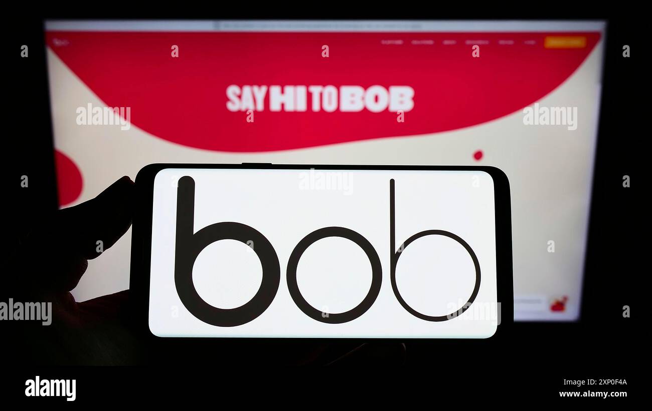 Stuttgart, Germany, 03-30-2022: Person holding smartphone with logo of ...