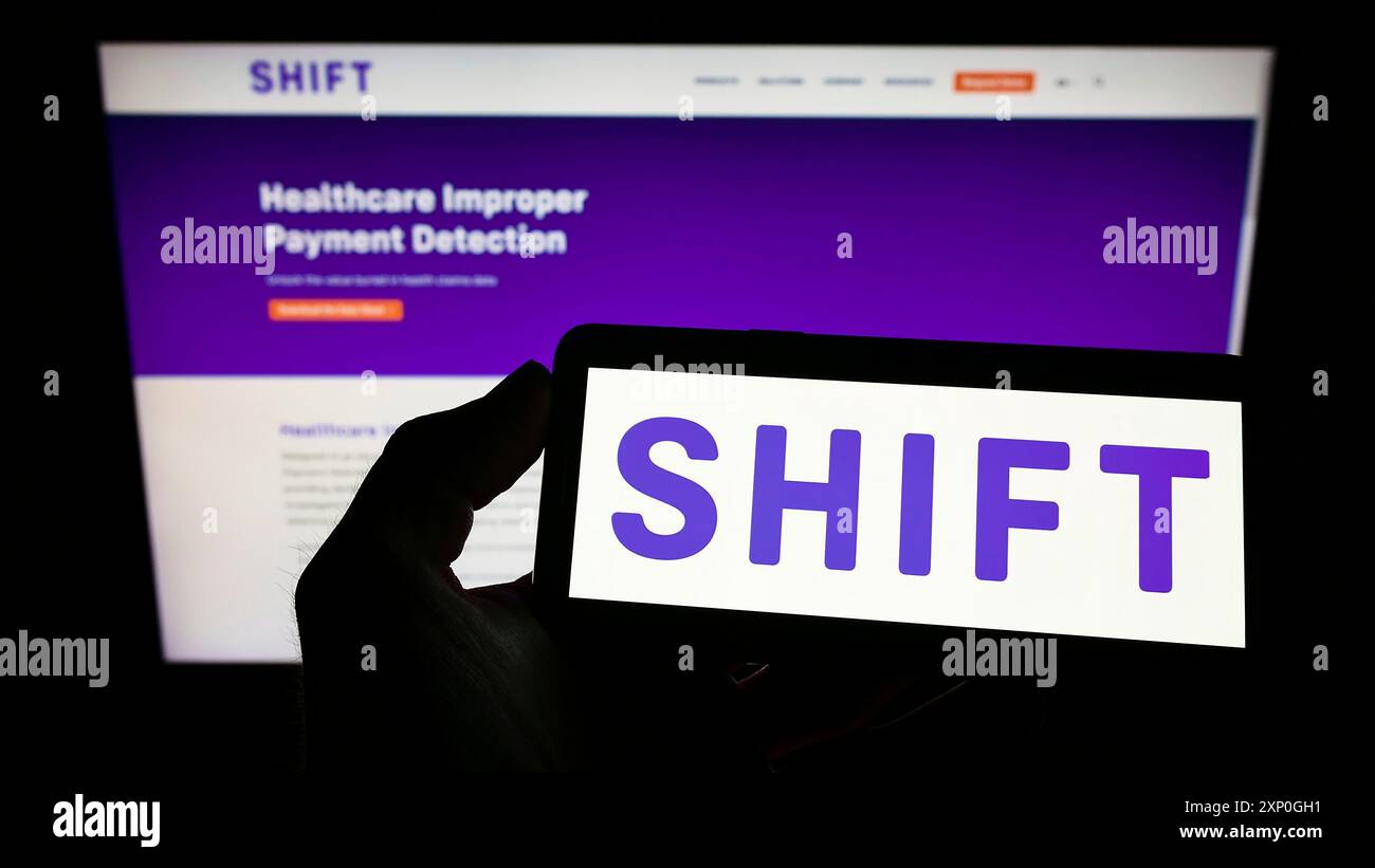 Stuttgart, Germany, 05-08-2022: Person holding smartphone with logo of artificial intelligence ...