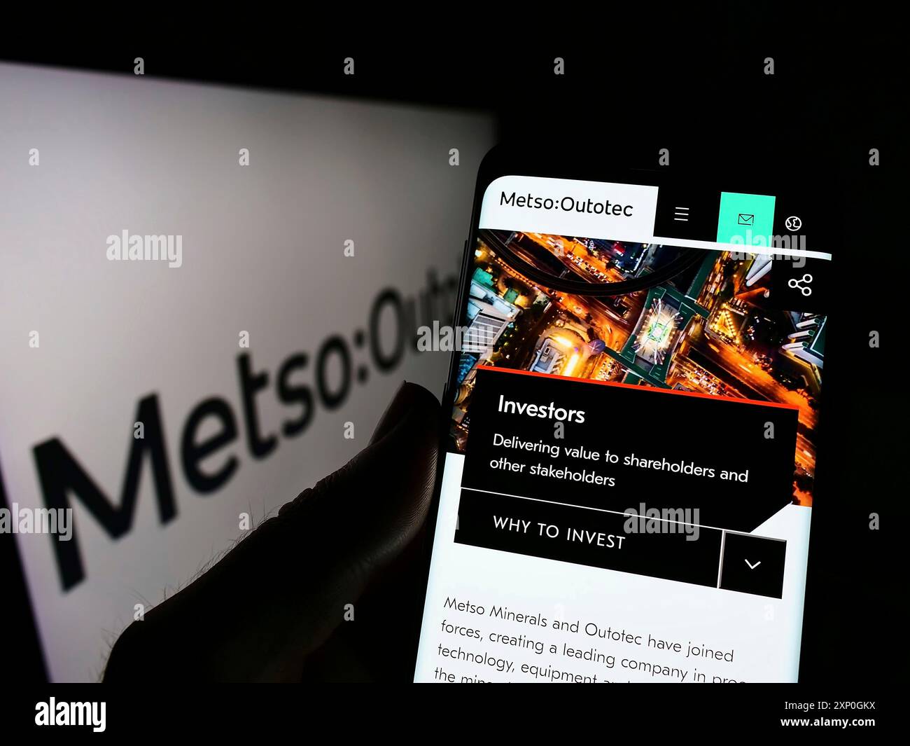 Stuttgart, Germany, 02-26-2022: Person holding cellphone with webpage ...