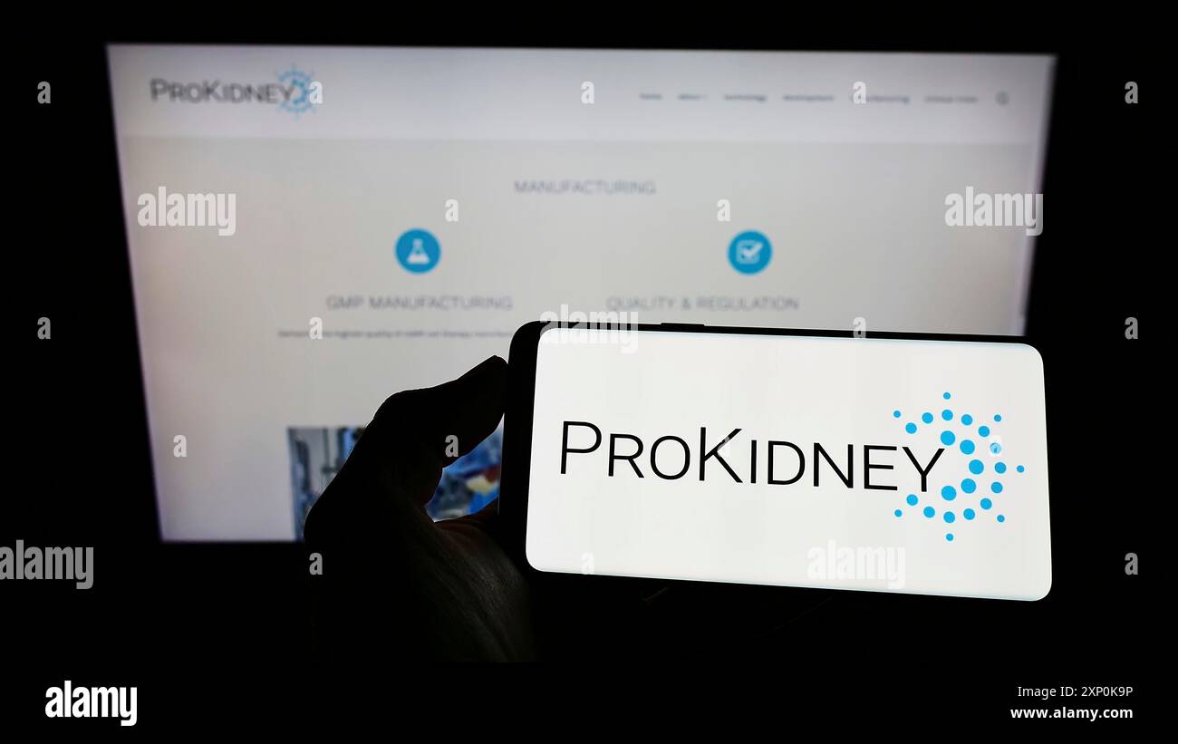 Stuttgart, Germany, 01-23-2022: Person holding cellphone with logo of ...