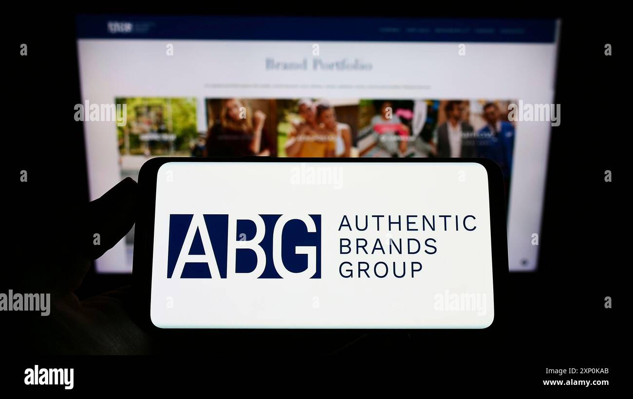 Stuttgart, Germany, 01-16-2022: Person holding smartphone with logo of ...