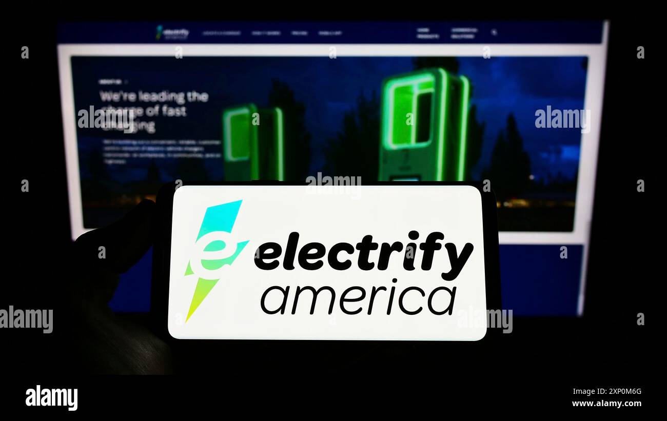 Stuttgart, Germany, 01-09-2022: Person holding mobile phone with logo ...