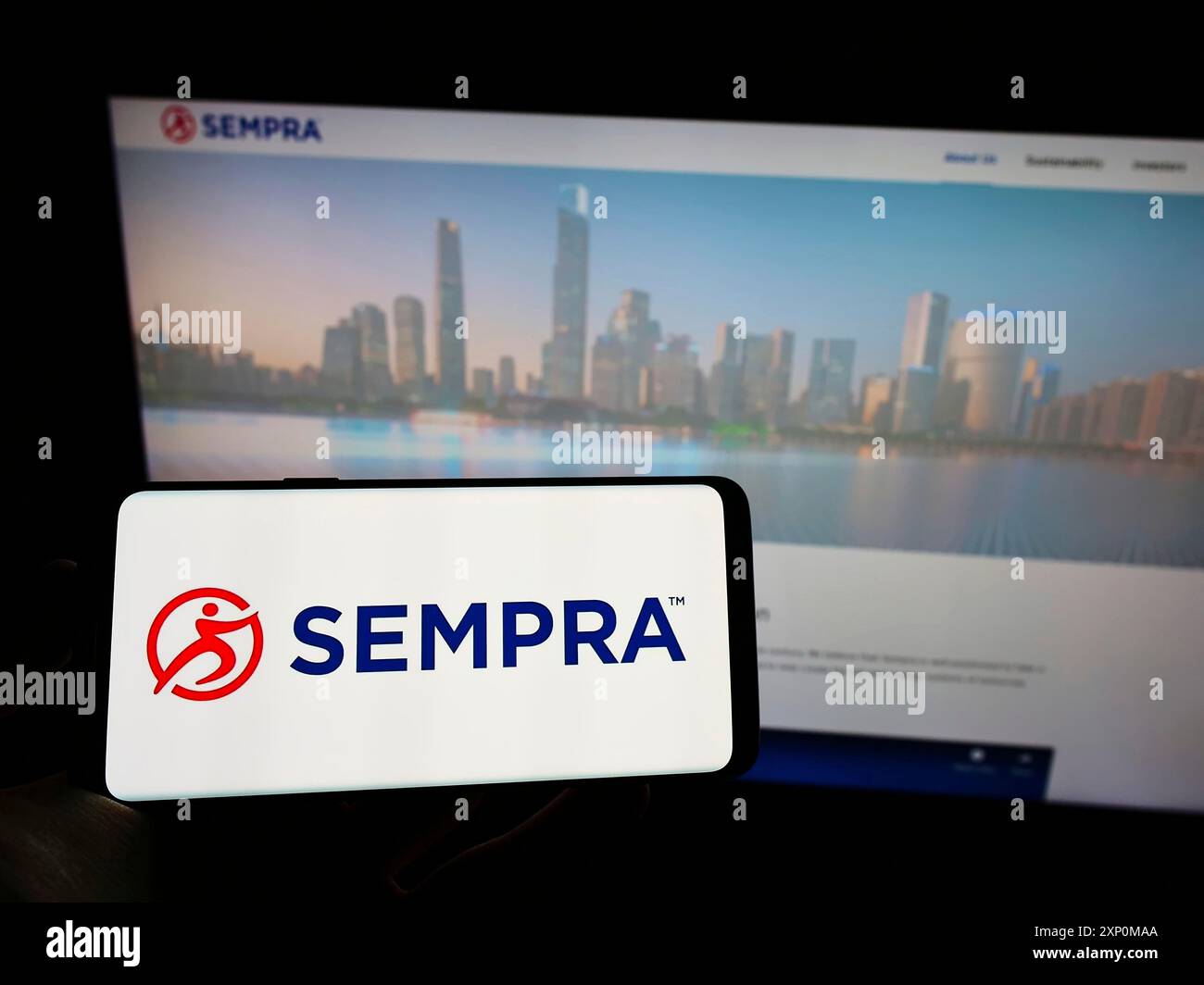 Stuttgart, Germany, 01-08-2022: Person holding smartphone with logo of ...