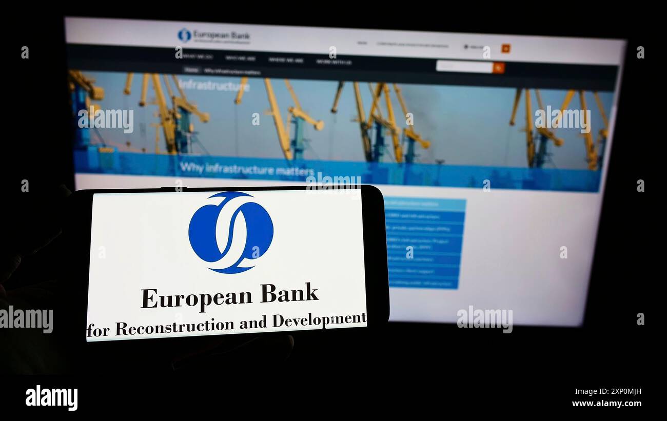 Stuttgart, Germany, 01-06-2022: Person holding cellphone with logo of European Bank for ...