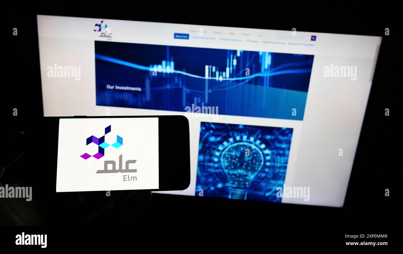 Stuttgart, Germany, 01-06-2022: Person holding mobile phone with logo ...