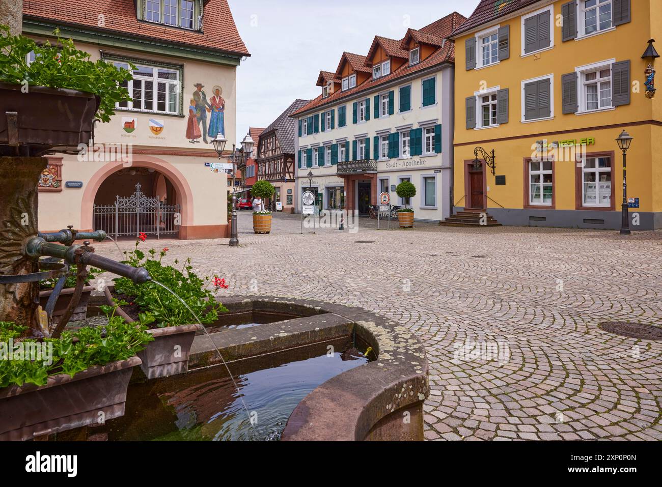 Market square with town hall fountain, houses and town hall in the old ...