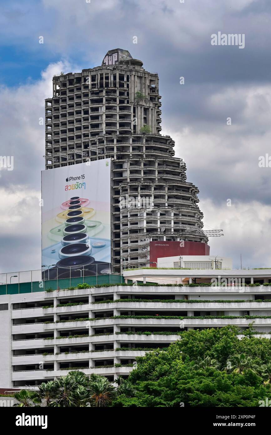 Sathorn Unique Tower with iphone advert, Bangkok, Thailand Stock Photo ...
