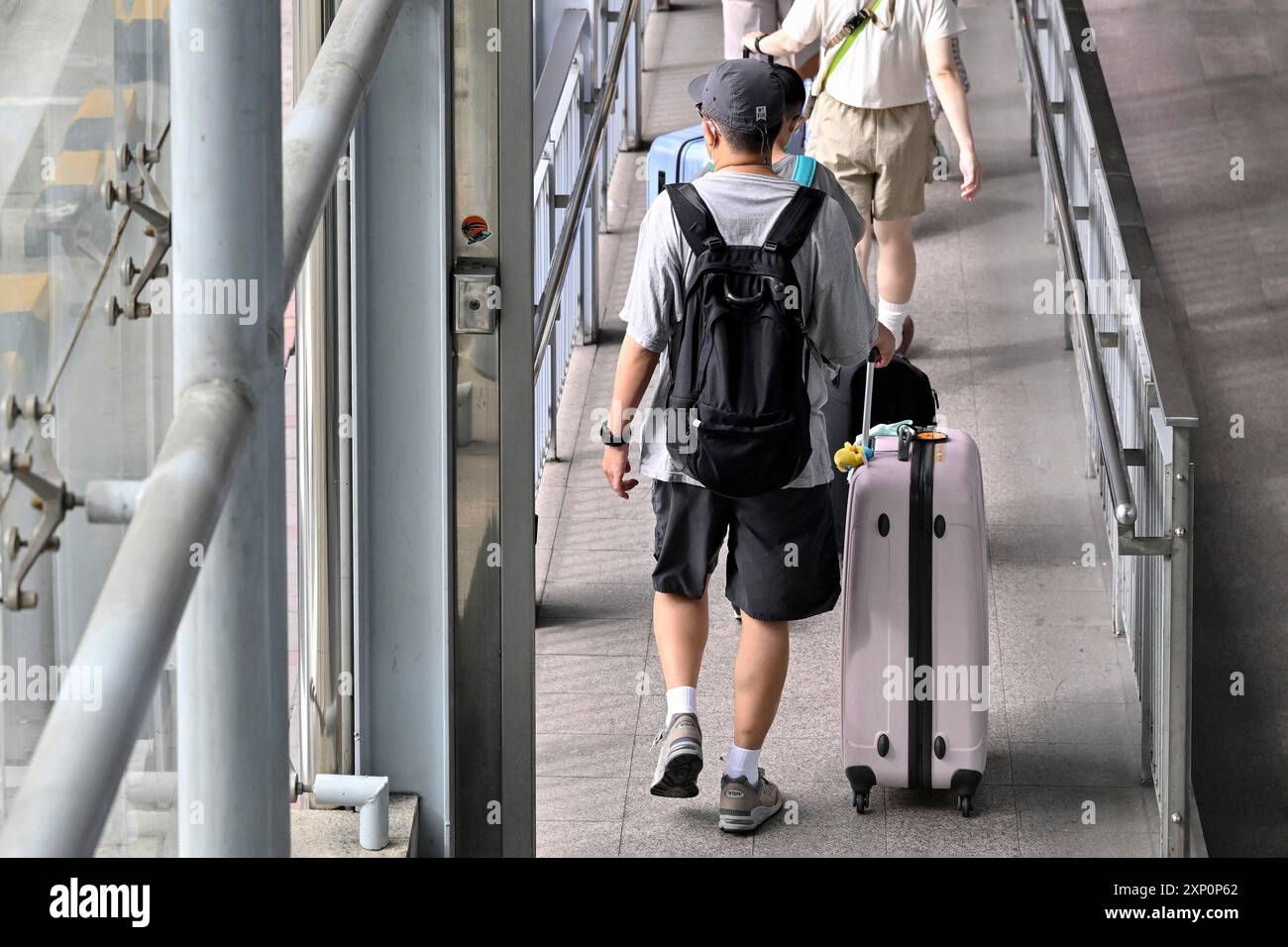 Male tourist suitcase hi-res stock photography and images - Alamy
