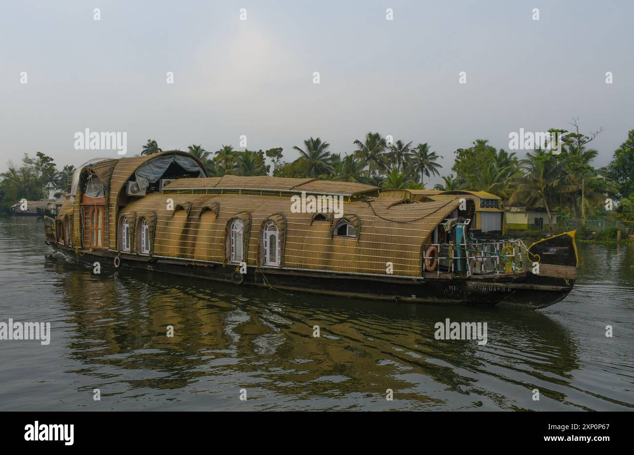 Houseboat in Kerala backwater sailing through the canals in Alappuzha ...