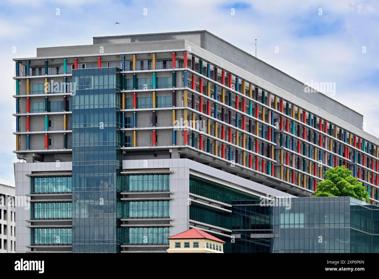 Building with coloured pillars Stock Photo - Alamy