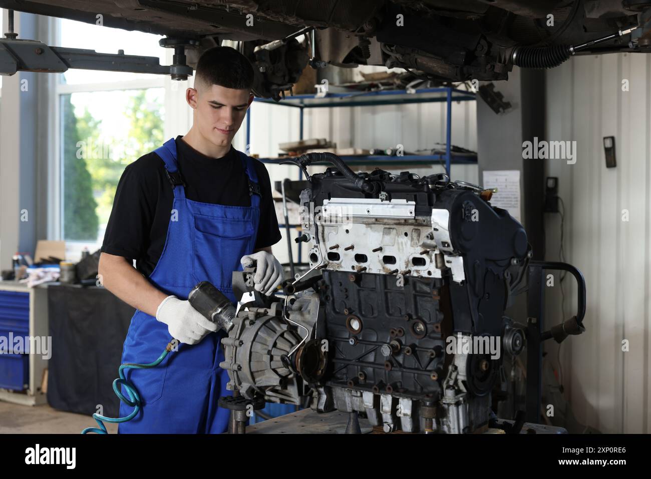Young motor mechanic checking hi-res stock photography and images - Alamy