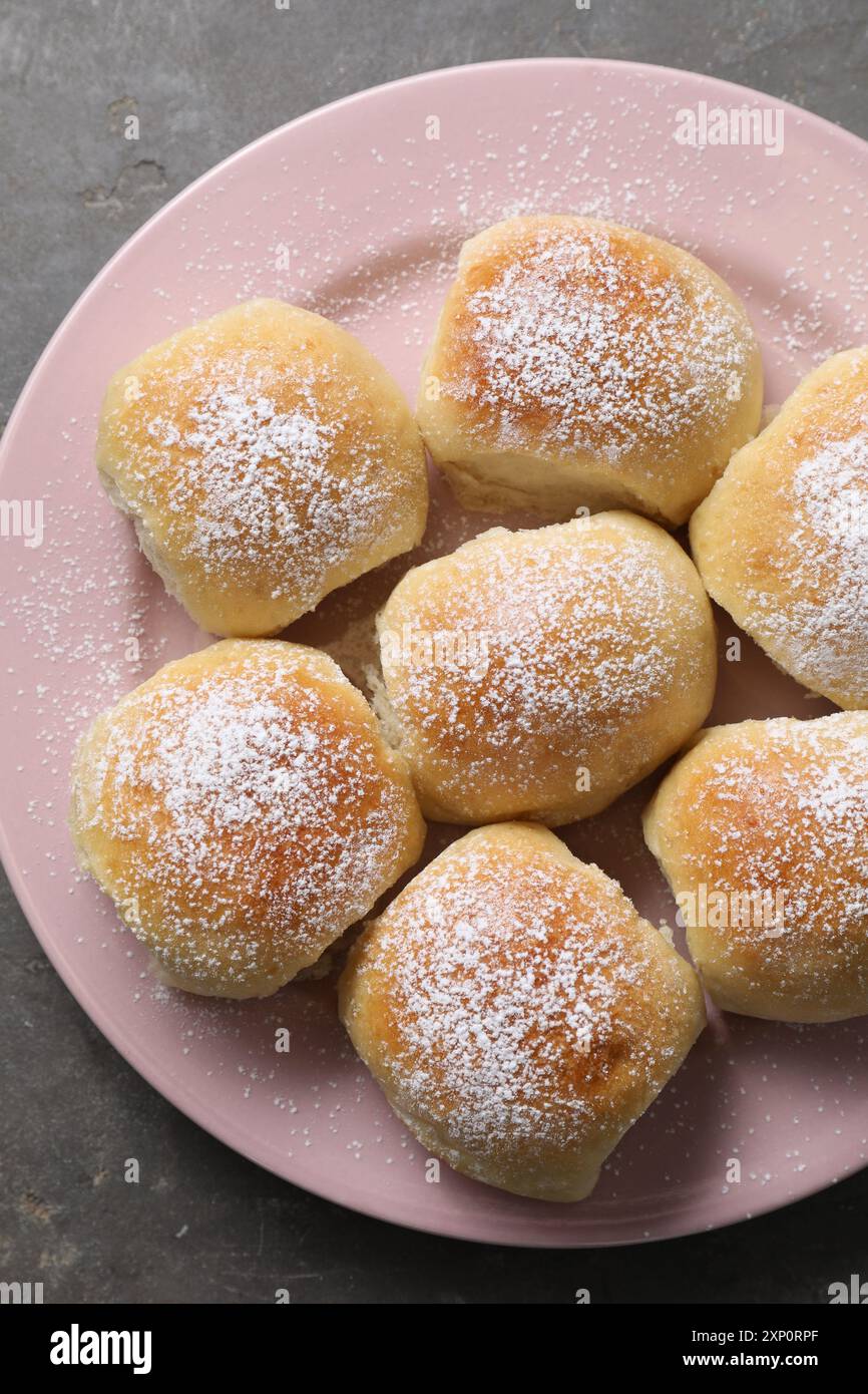 Delicious dough balls on grey table, top view Stock Photo - Alamy