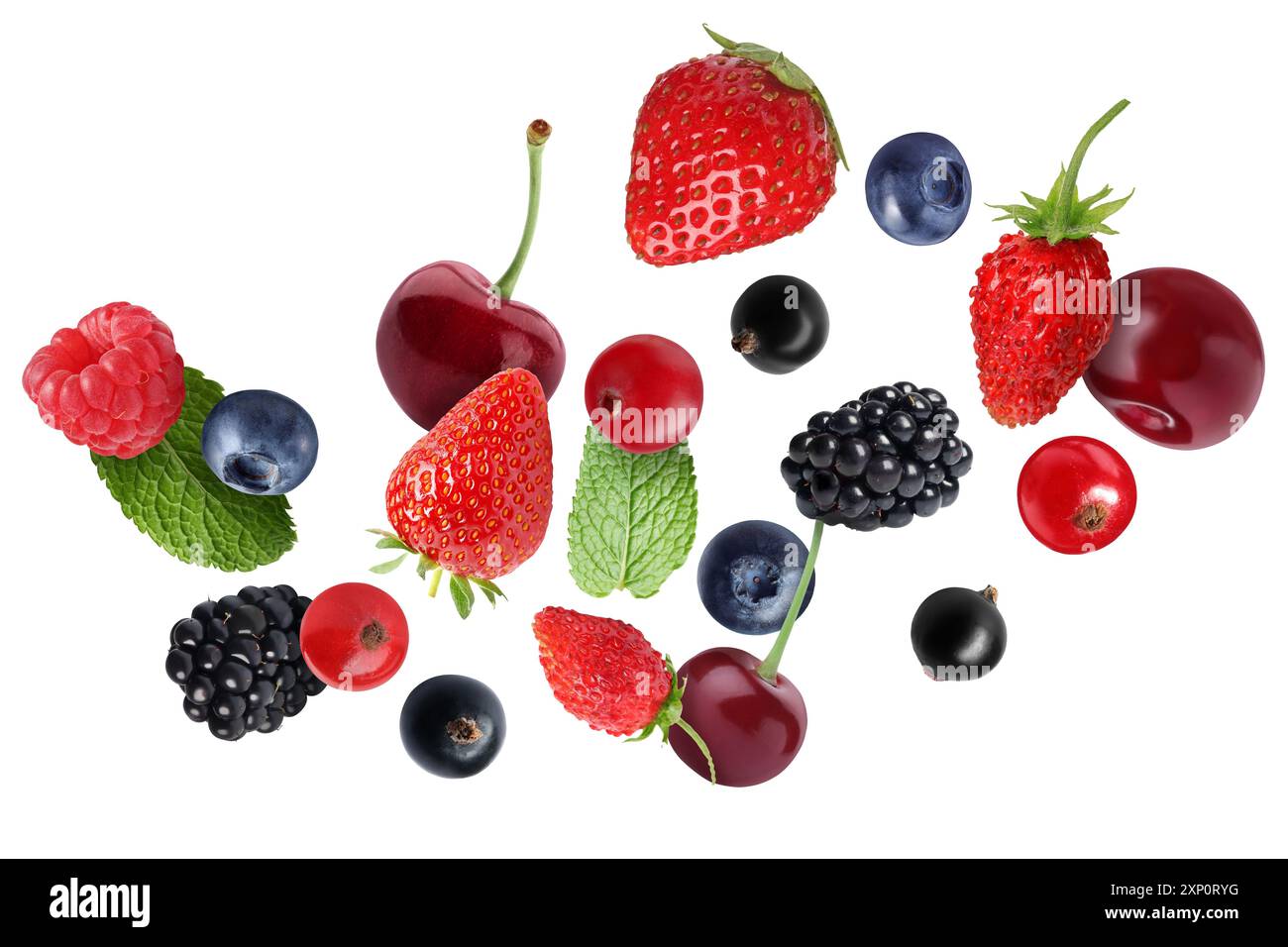 Different fresh berries in air on white background Stock Photo - Alamy