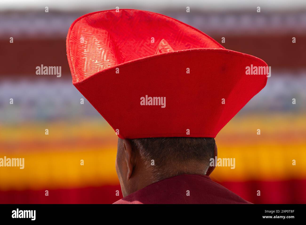 An abstract portrait of a Buddhist monk wearing a traditional hat and ...