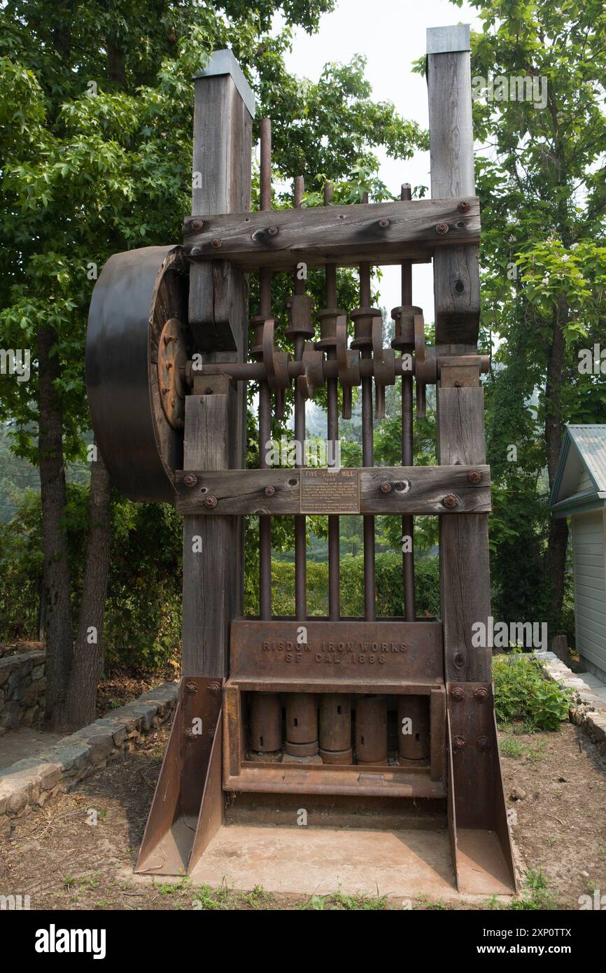 Five unit Californian stamp mill. Offset cams lifted each stamp and ...