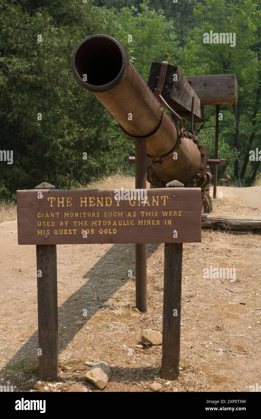 Giant hydraulic monitor used for washing away gravel and hillsides ...