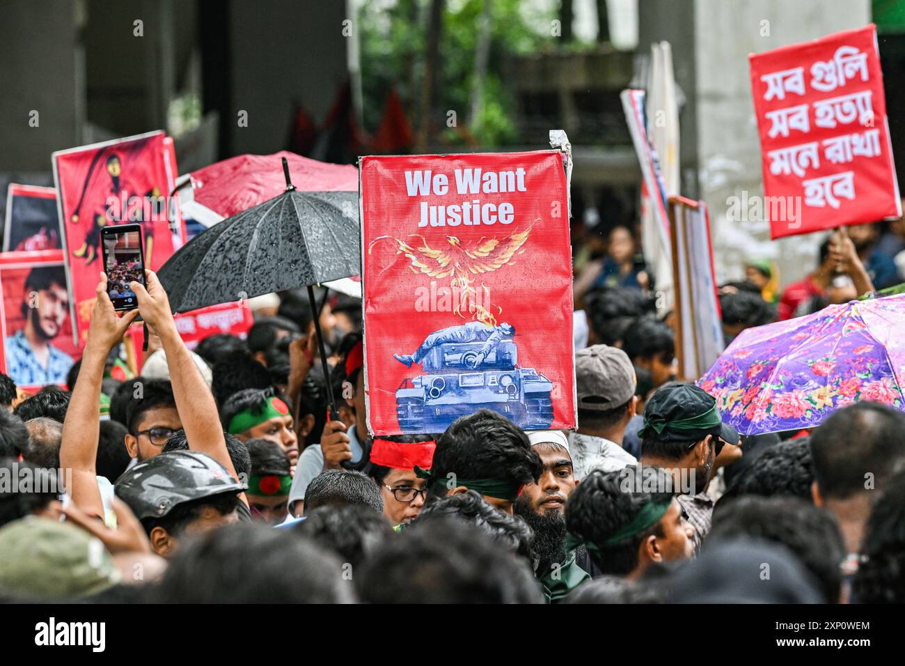 Dhaka, Bangladesh. 02nd Aug, 2024. Protesters hold placards expressing ...