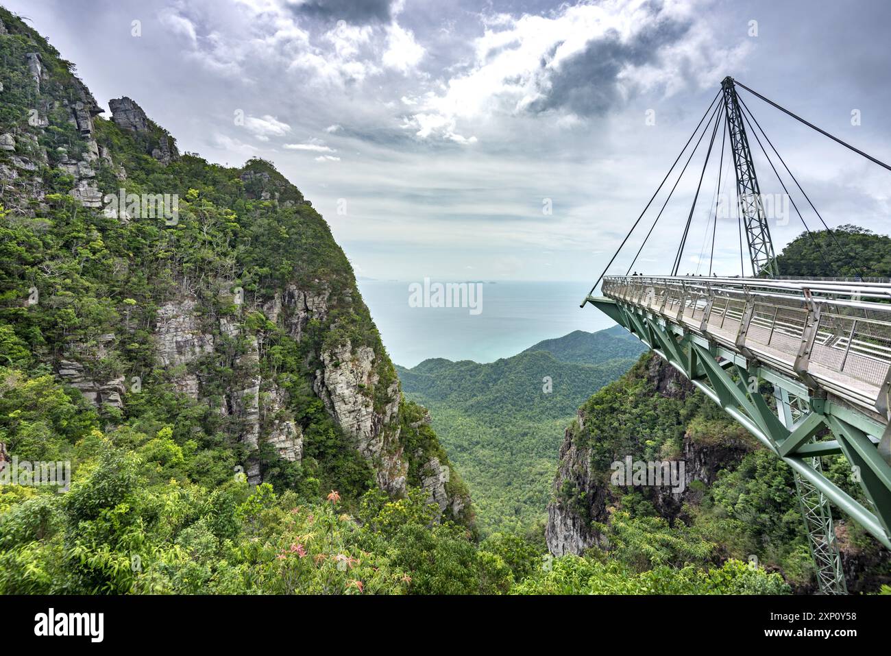 Winding high over the forested peaks of Mat Cincang mountaini,a major ...