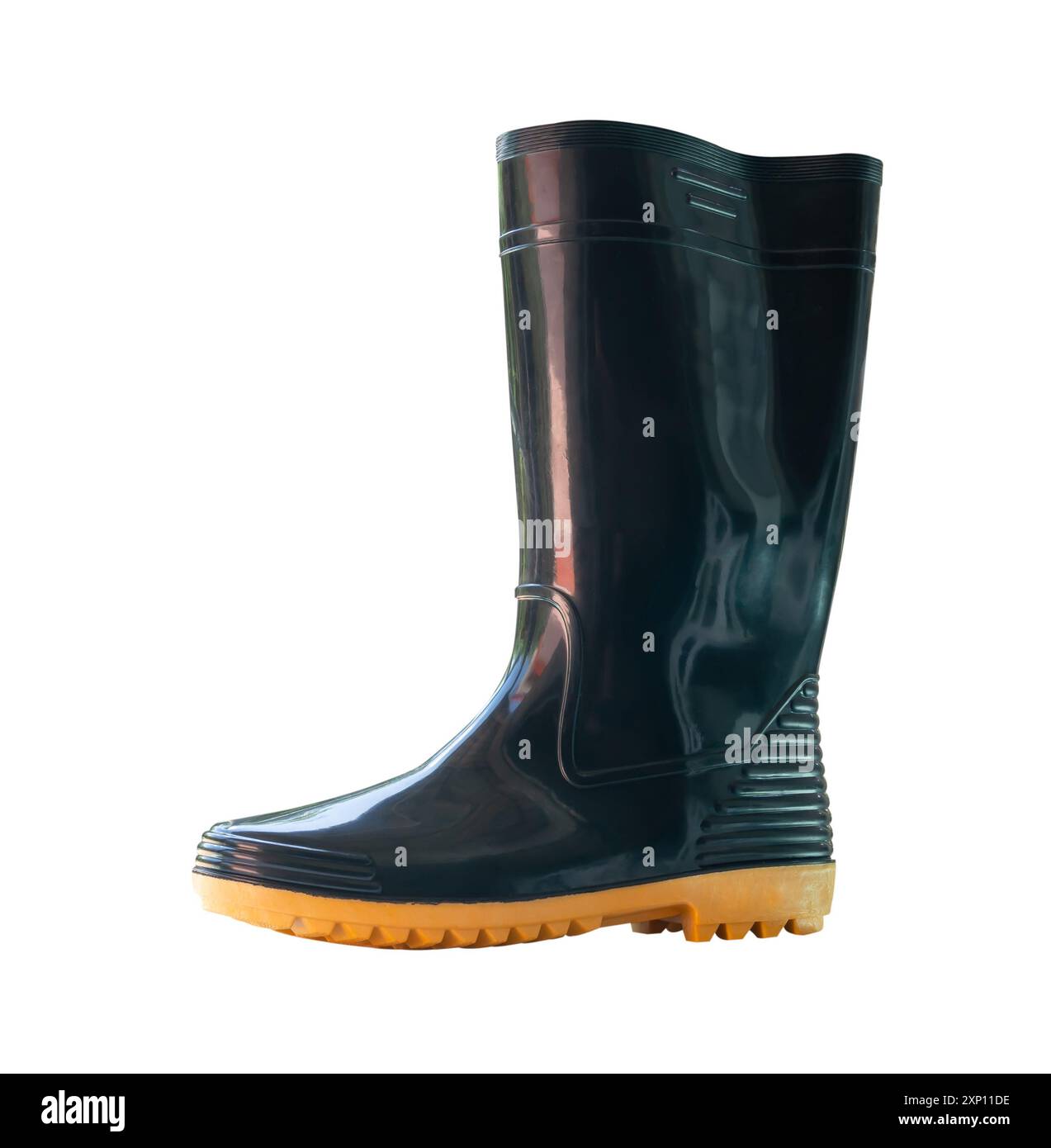 Side view of one side of black gumboots or rubber boots is isolated on ...