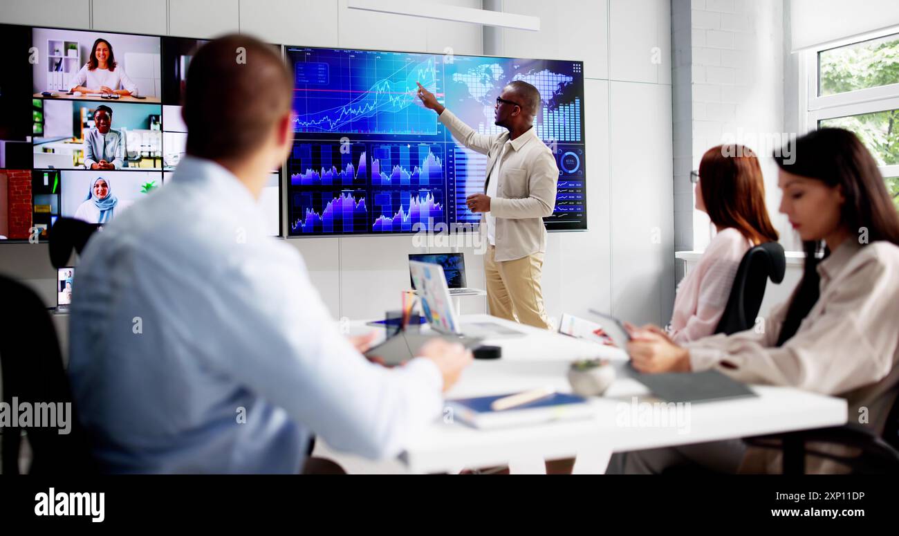 Business Presentation In Meeting Room. People Looking At Dashboard ...