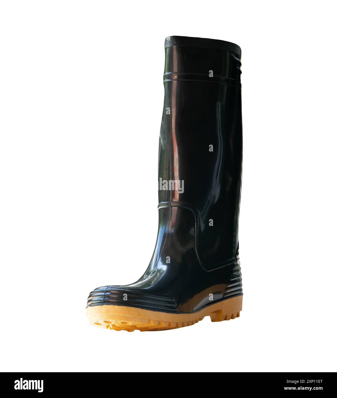 Side view of one side of black gumboots or rubber boots is isolated on ...
