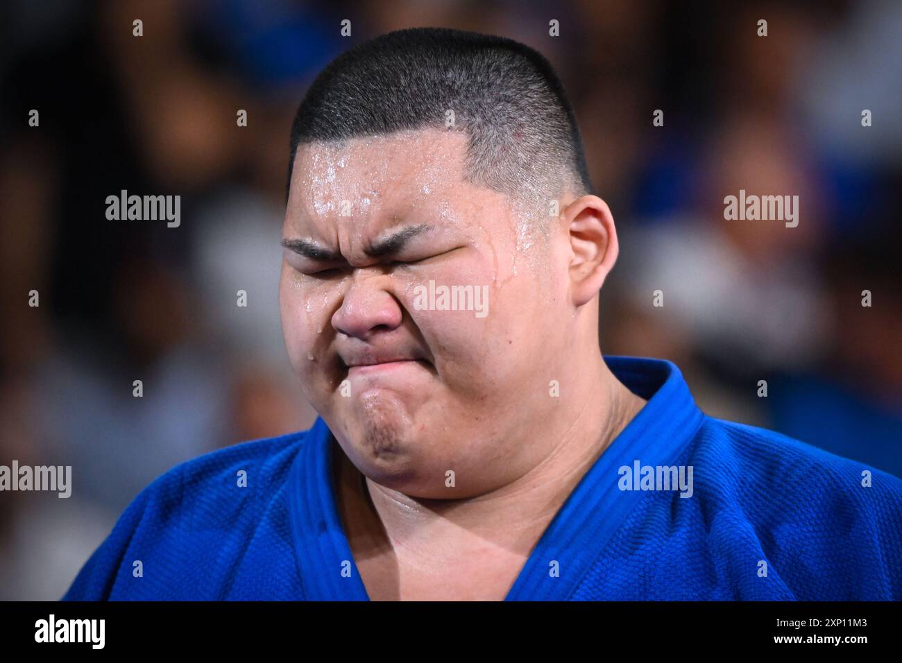 Tatsuru Saito ( JPN ) looks dejected after loosing against Kim Minjong ...