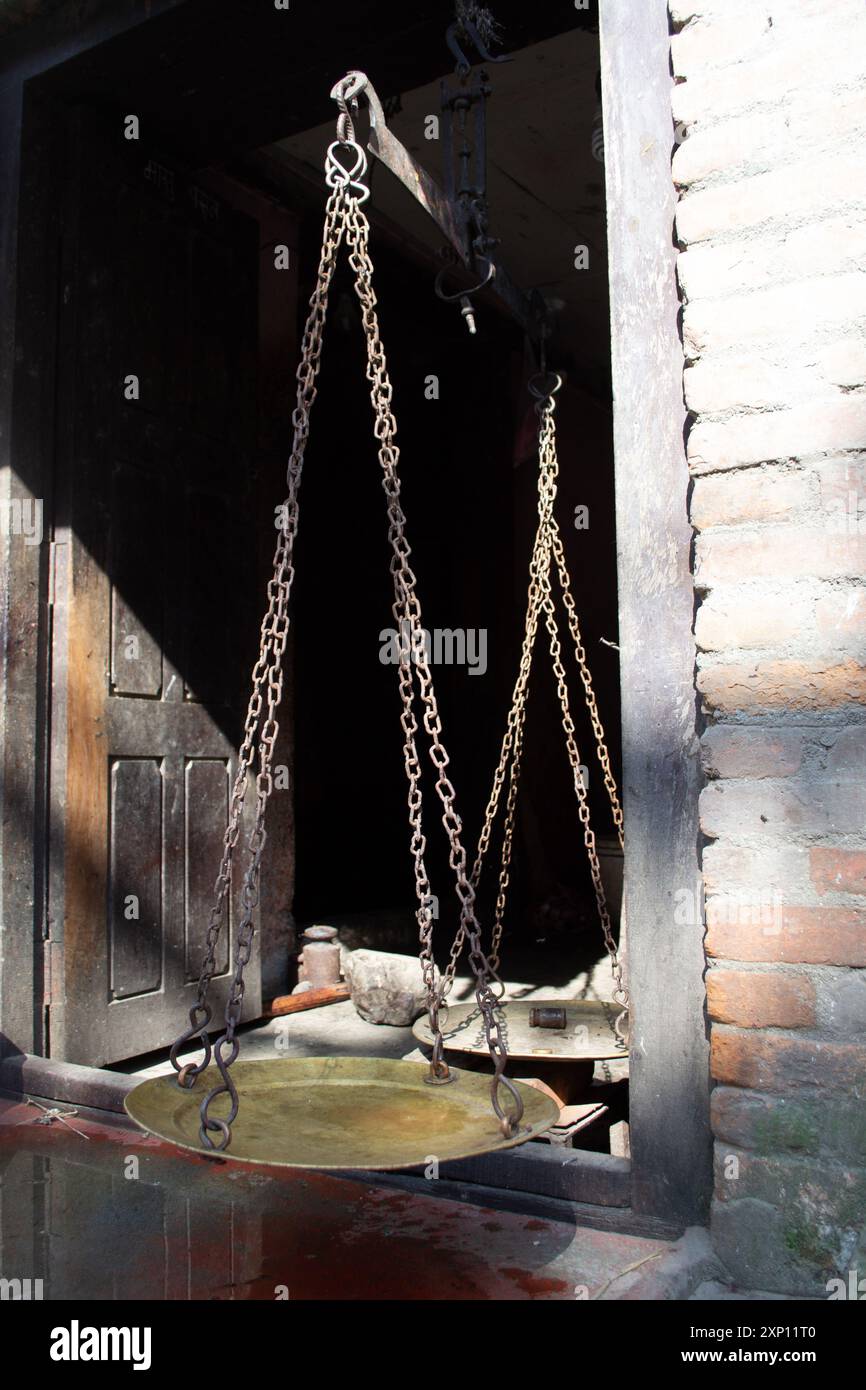 Balance scale lays idle in the old town of Bhaktapur Stock Photo - Alamy