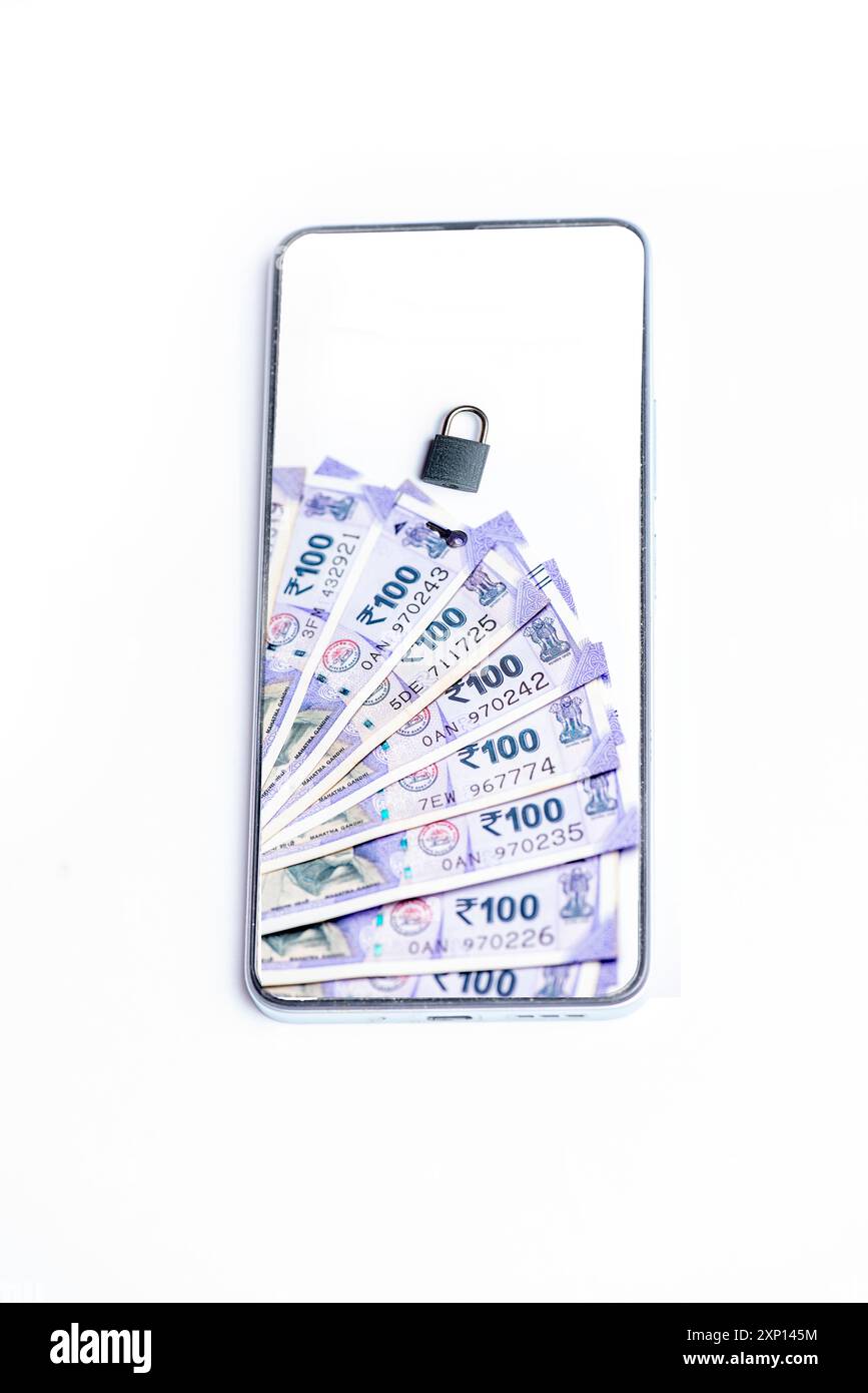 Smart phone and Indian one hundred rupees lock by phone screen isolated ...