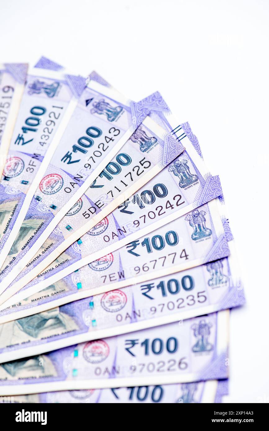 Too many Indian hundred rupees bank note paper currency on isolated ...