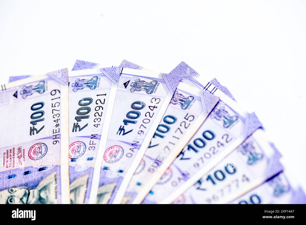 Too many Indian hundred rupees bank note paper currency on isolated ...