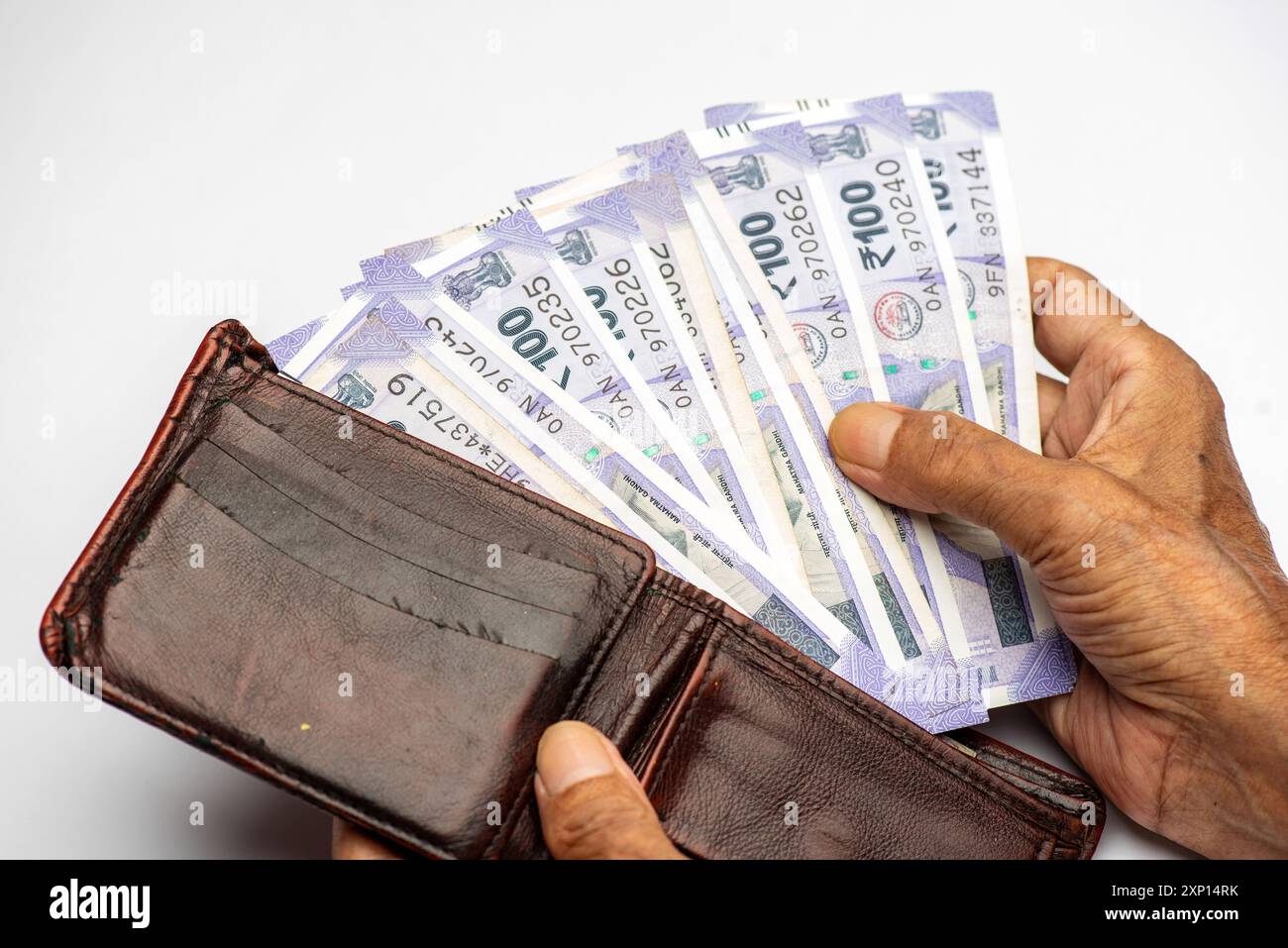 Close-up of Counting Indian rupee isolated on white background Stock ...